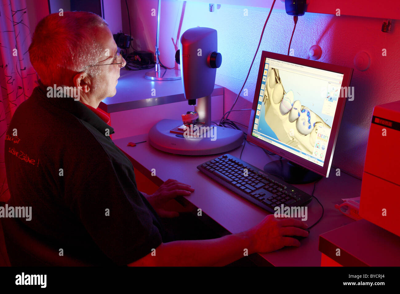 Dental laboratory, dental technician at work, tooth prosthesis, health ...