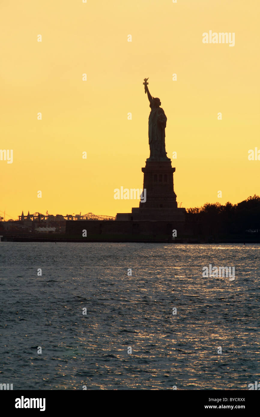 The Statue of Liberty at sunset Stock Photo - Alamy