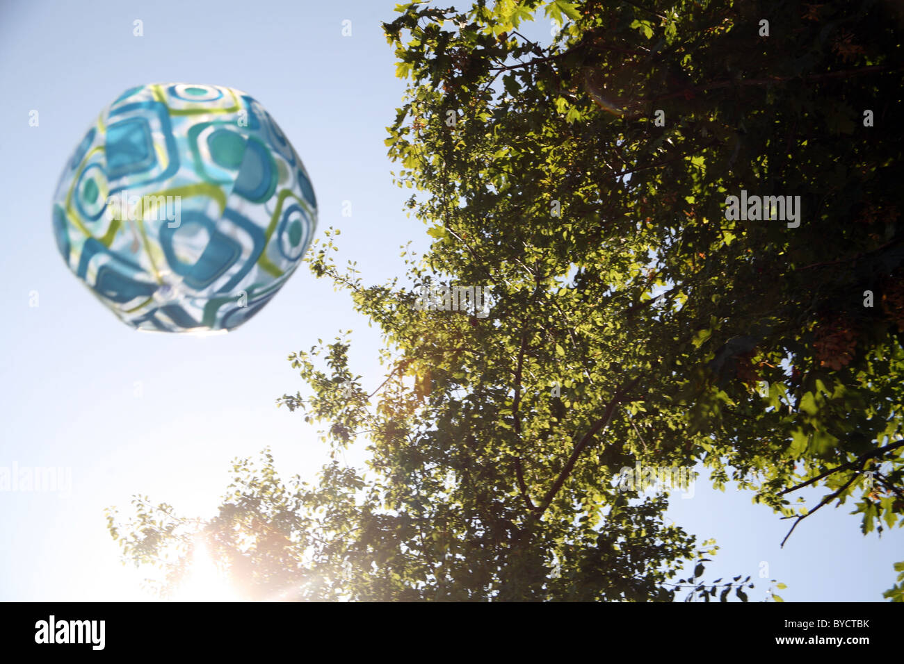 Rubber ball flying in the air Stock Photo - Alamy