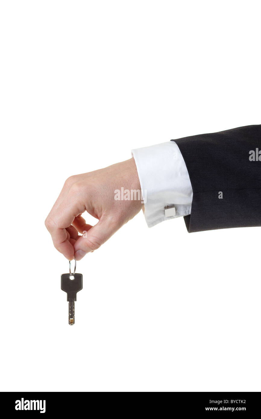 Man's hand holding a key Stock Photo - Alamy