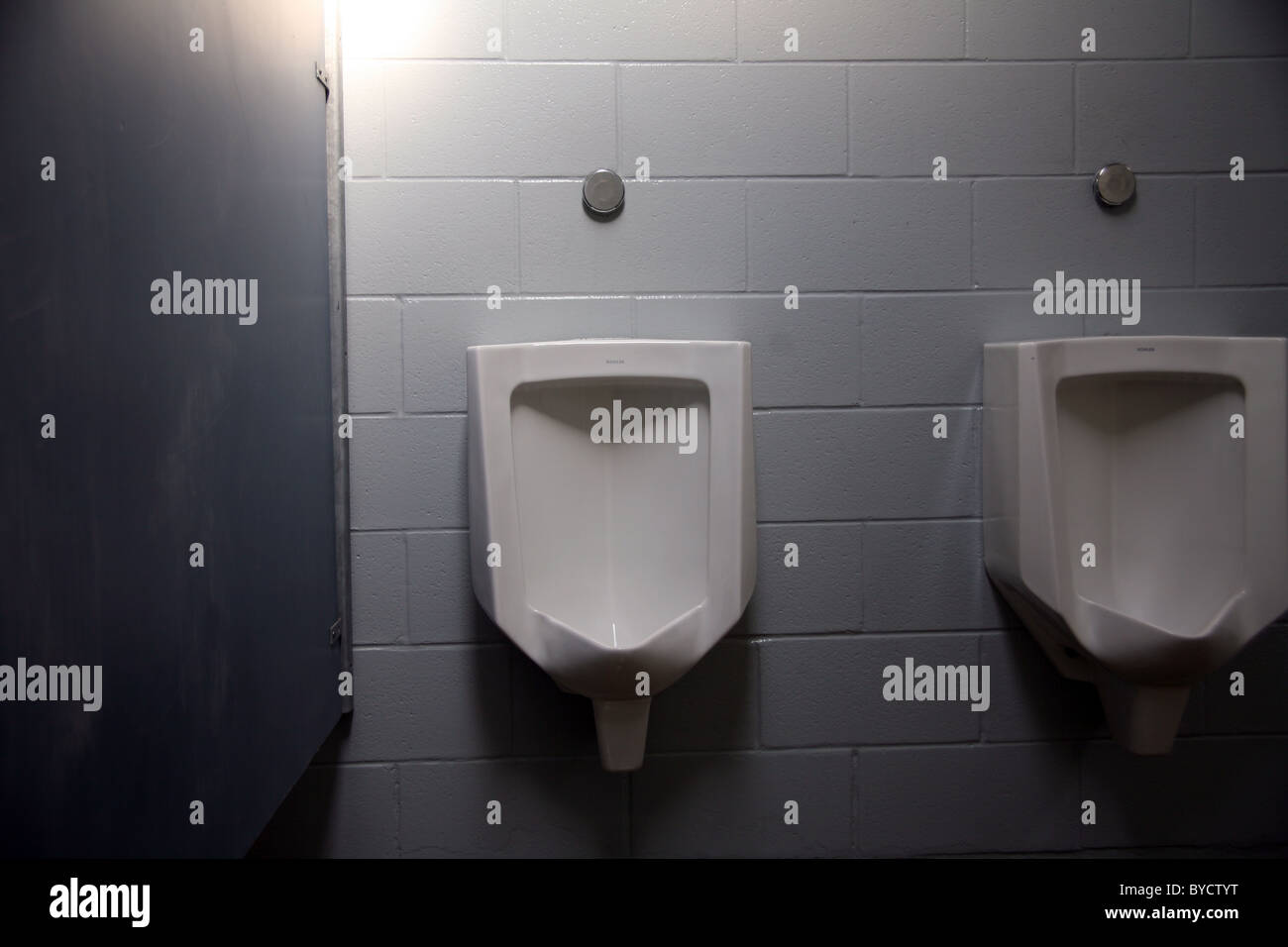 Urinals in restroom Stock Photo - Alamy