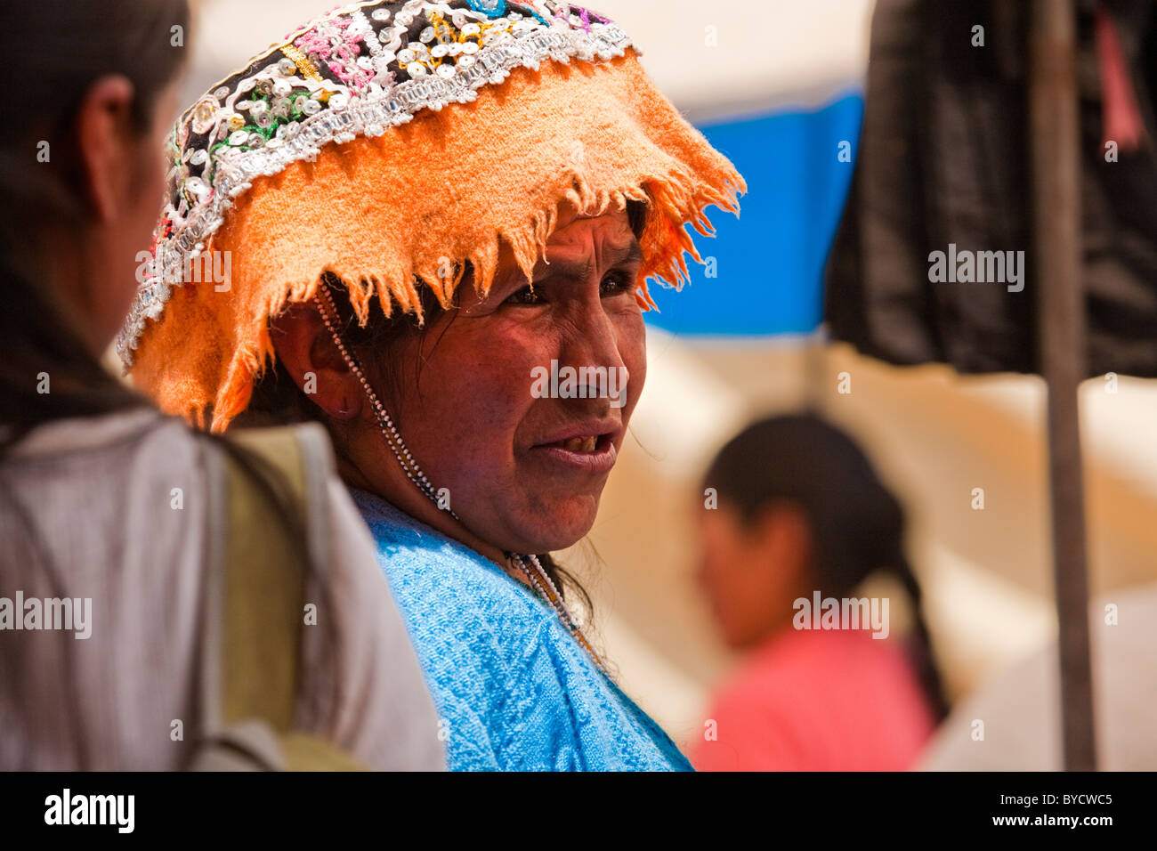 Colorful Peruvian lady wearing traditional hat, Pisac, Peru, South ...