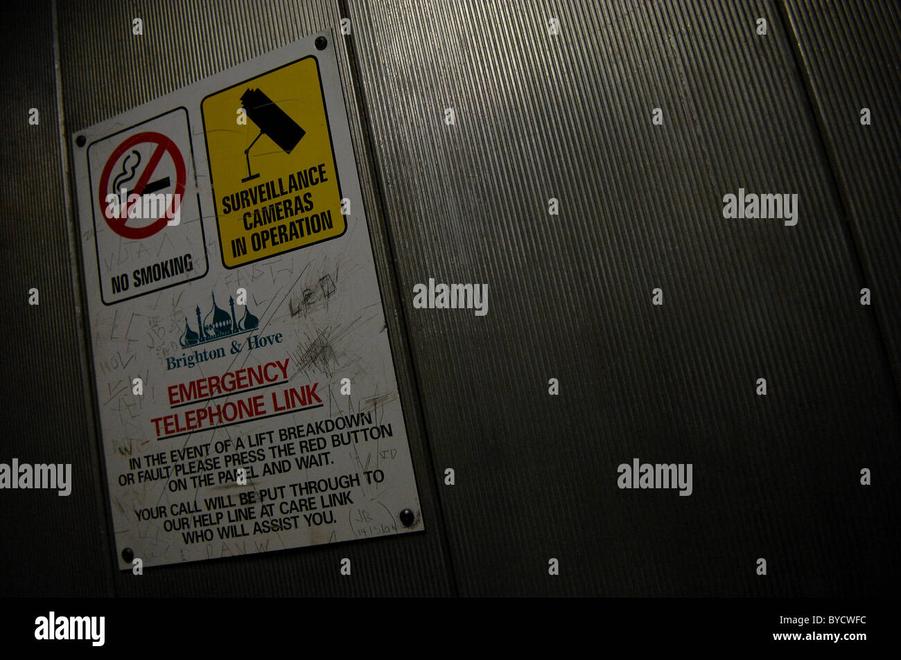 The warnings sign on the inside of a block of council flats lift in ...