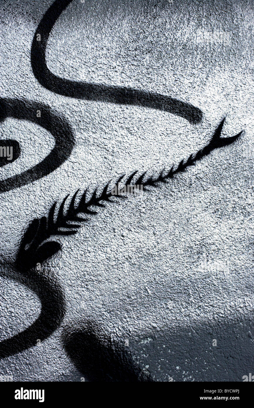 Graffiti on the wall of a sardine spine Stock Photo - Alamy