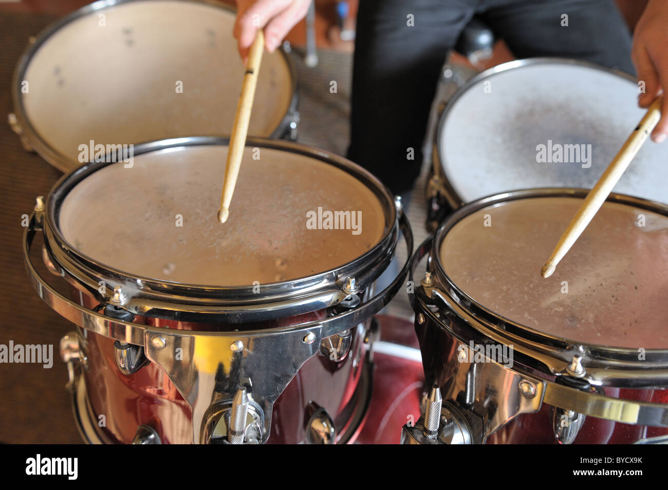 The drummer in action. A photo close up process play on a musical ...