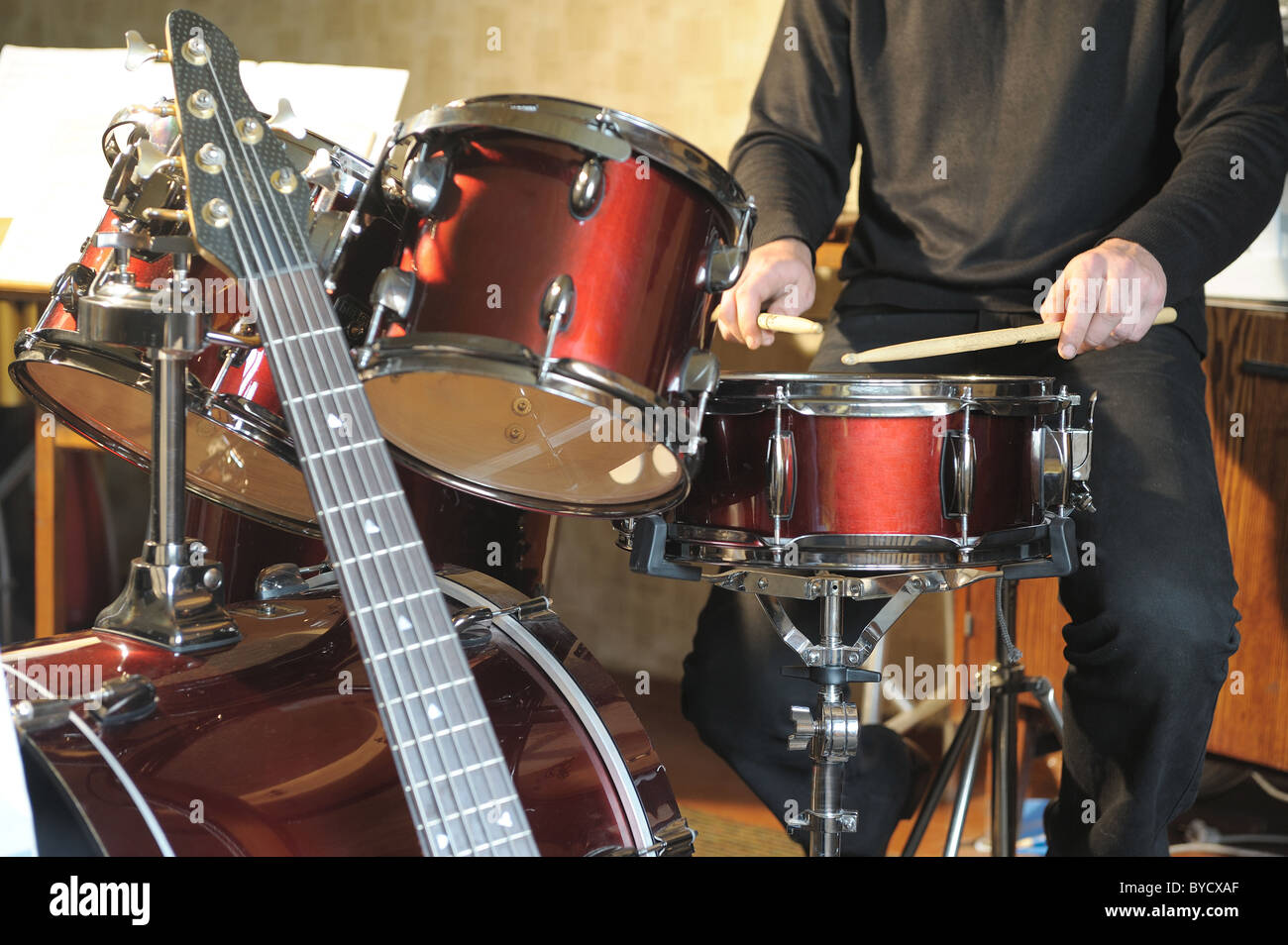 The drummer in action. A photo close up process play on a musical ...