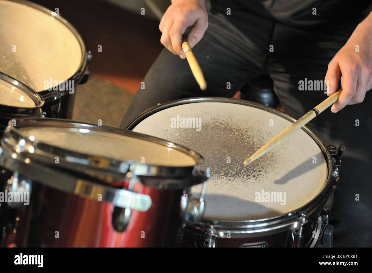 The drummer in action. A photo close up process play on a musical ...