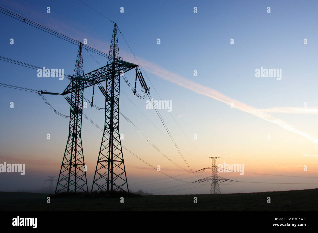 High voltage electricity pylons over sky Stock Photo - Alamy High voltage electricity pylons over sky Stock Photo - Alamy