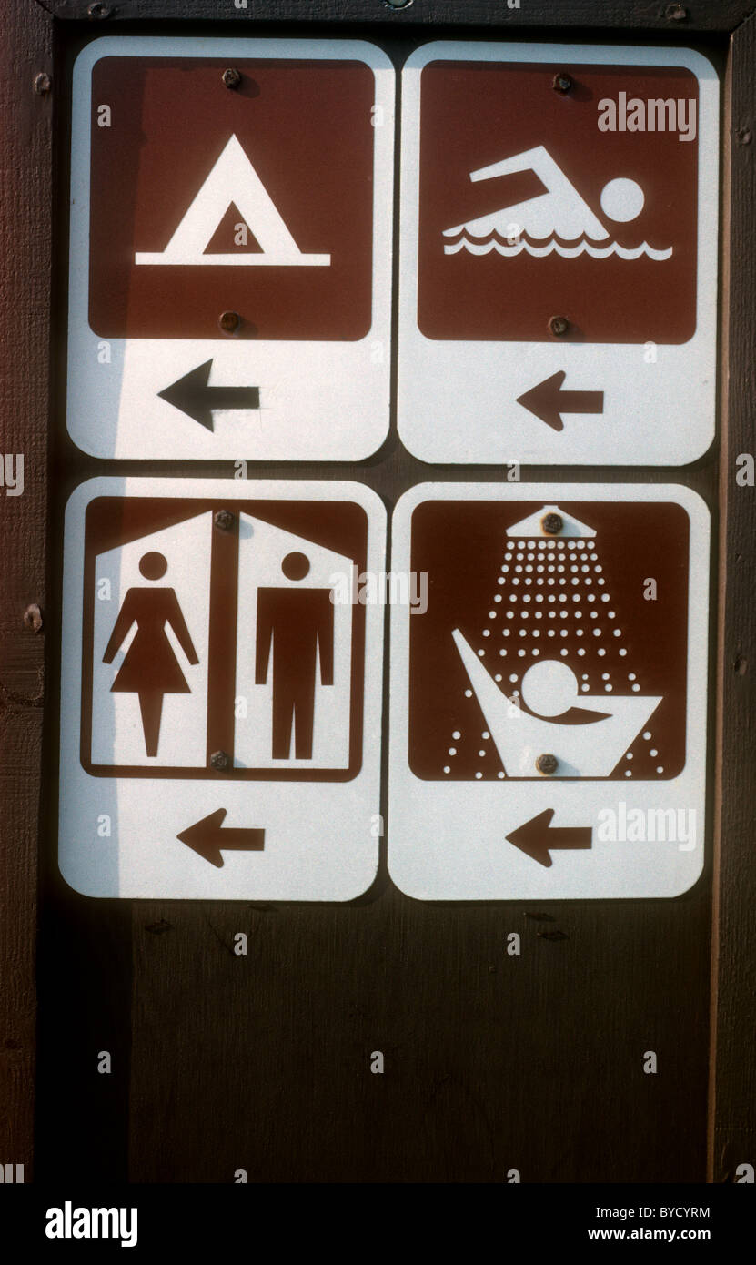 Pictograms on a fence in a park in New York State describe activities ...