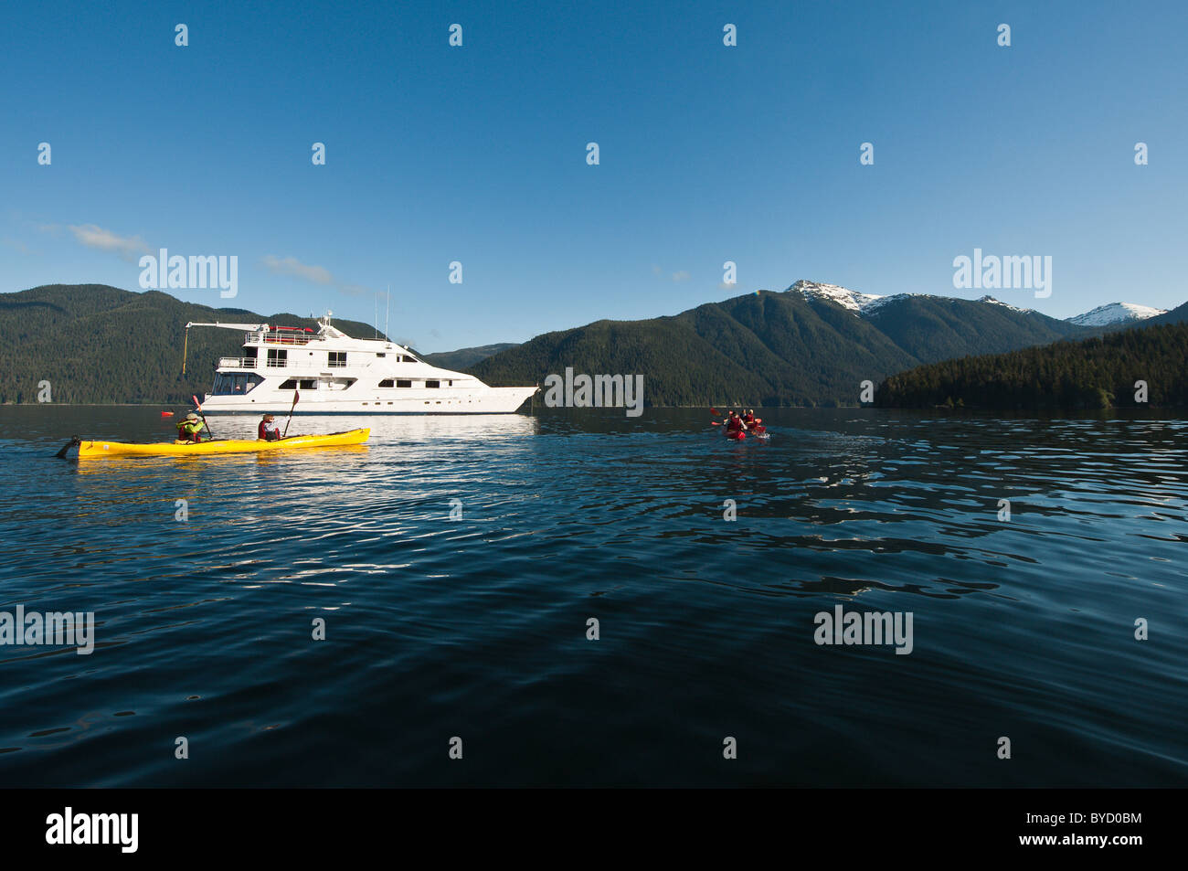 Alaska. Safari Quest and kayakers in Windham Bay in the Chuck River ...