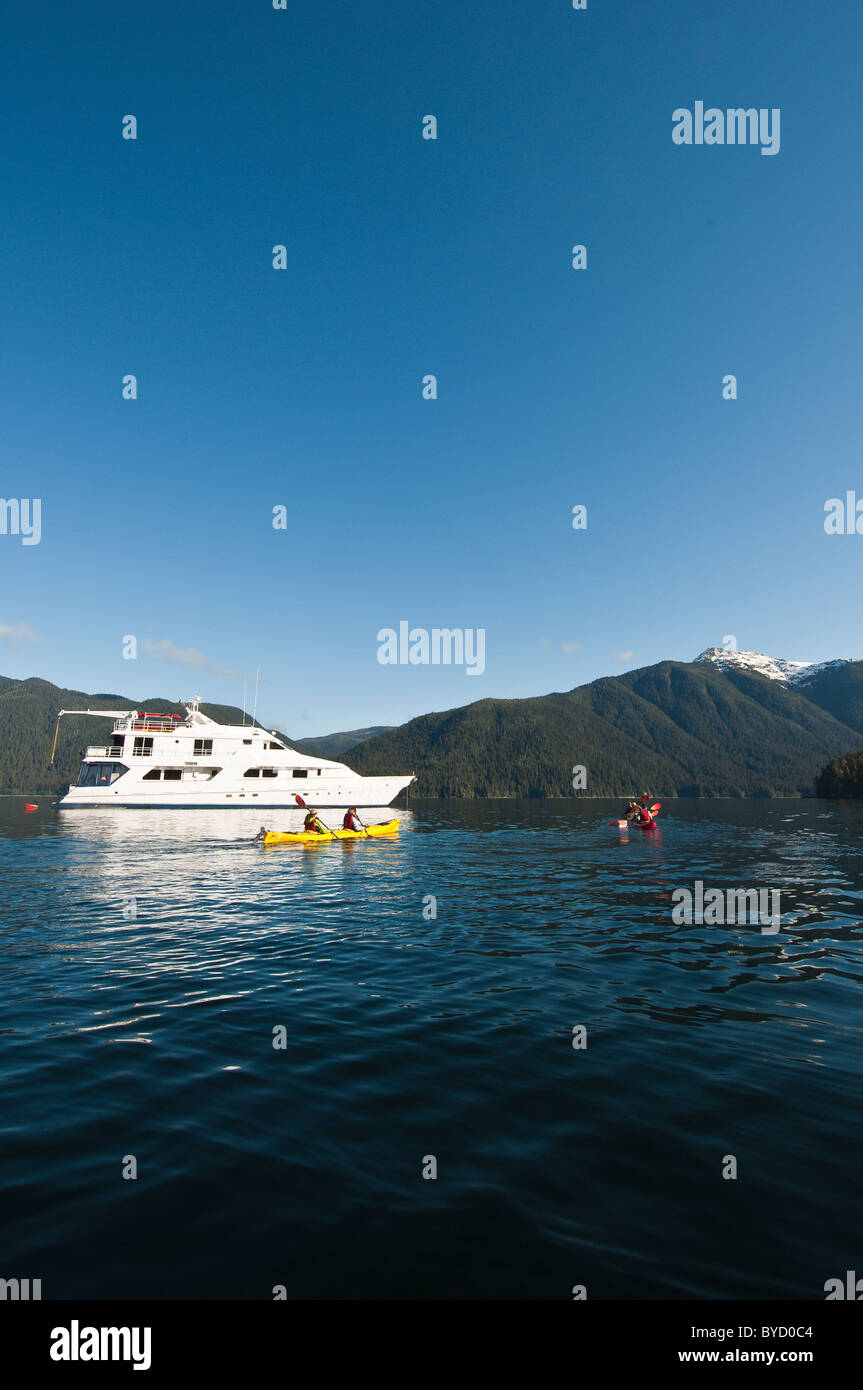 Alaska. Safari Quest and kayakers in Windham Bay in the Chuck River ...