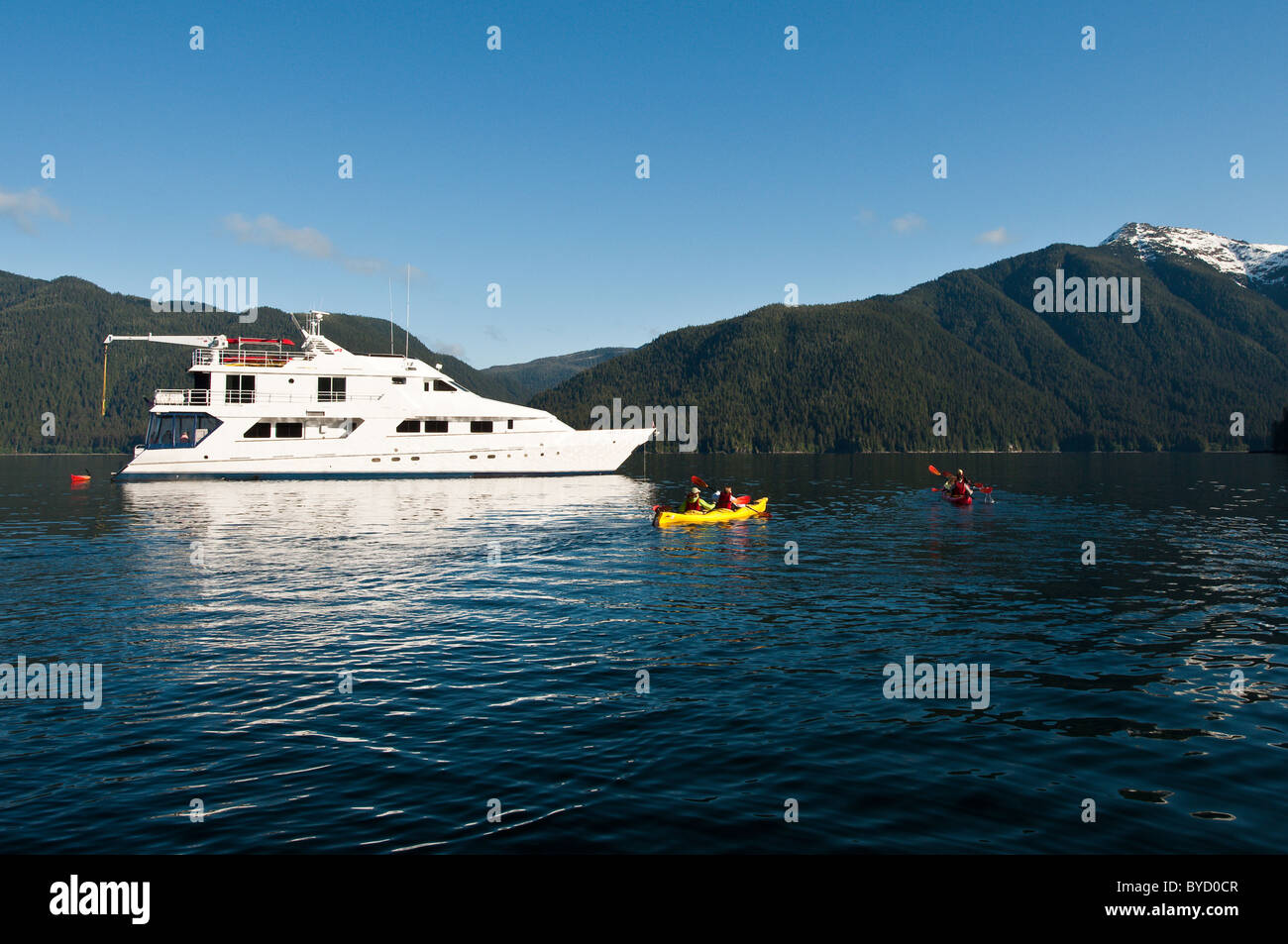 Alaska. Safari Quest and kayakers in Windham Bay in the Chuck River ...