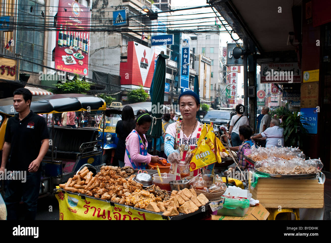 Woman trader, Cooked Food stall at the market in China town, Bangkok ...