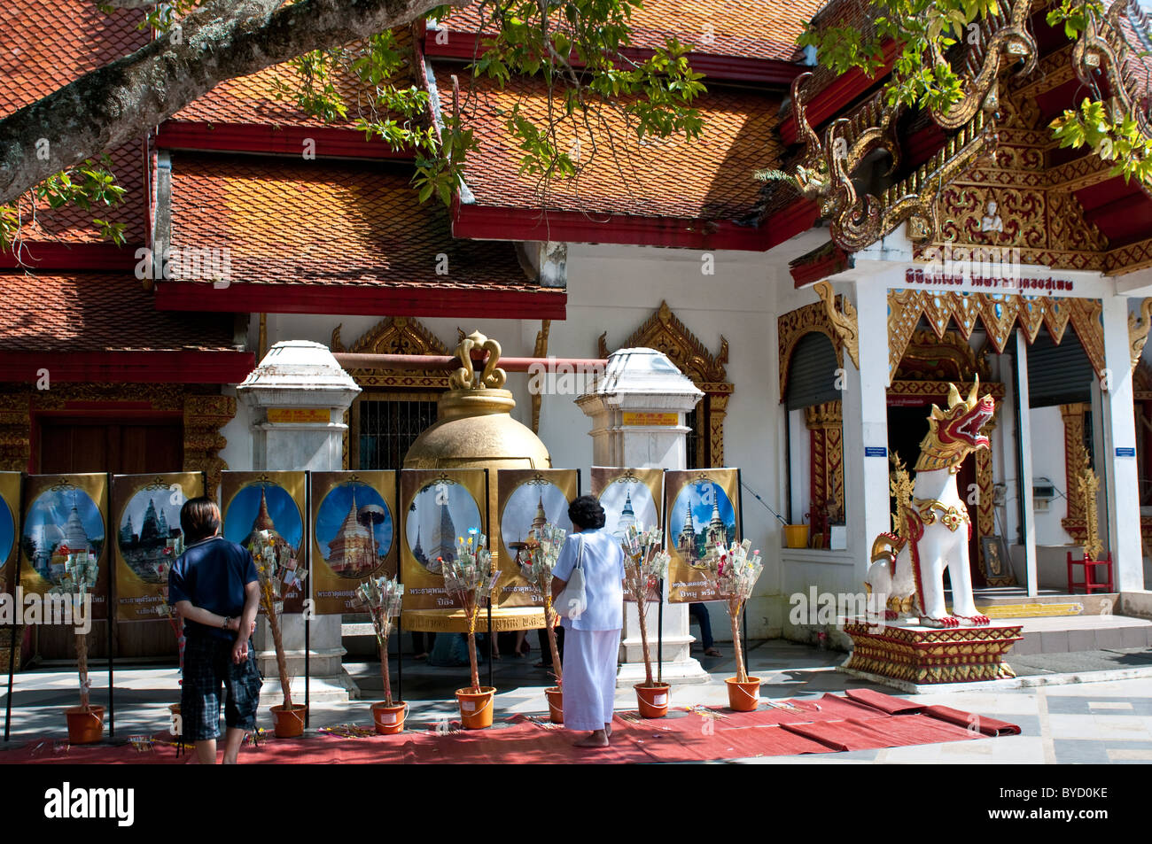 Worshiper giving money offerings, Wat Phra That Doi Suthep, Chiang Mai ...