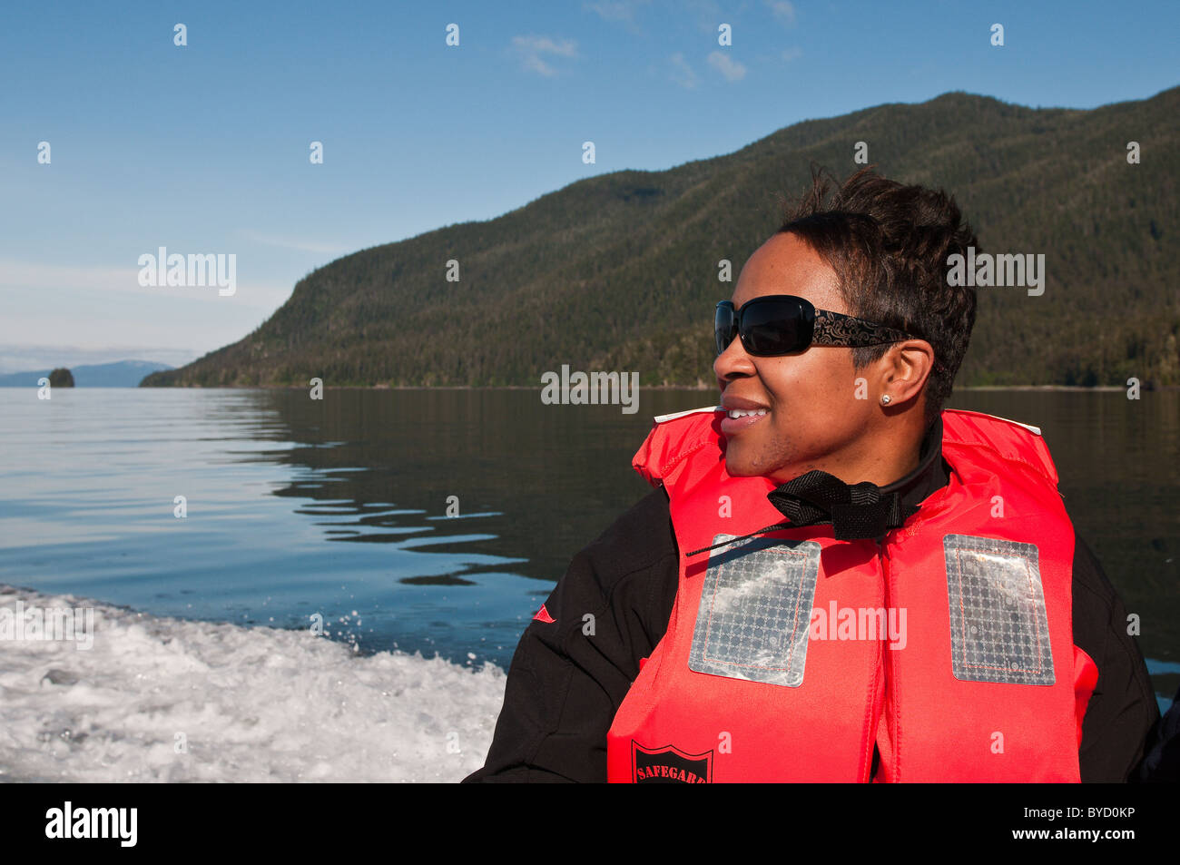 Young black woman in Windham Bay, Chuck River Wilderness Area, Tongass ...
