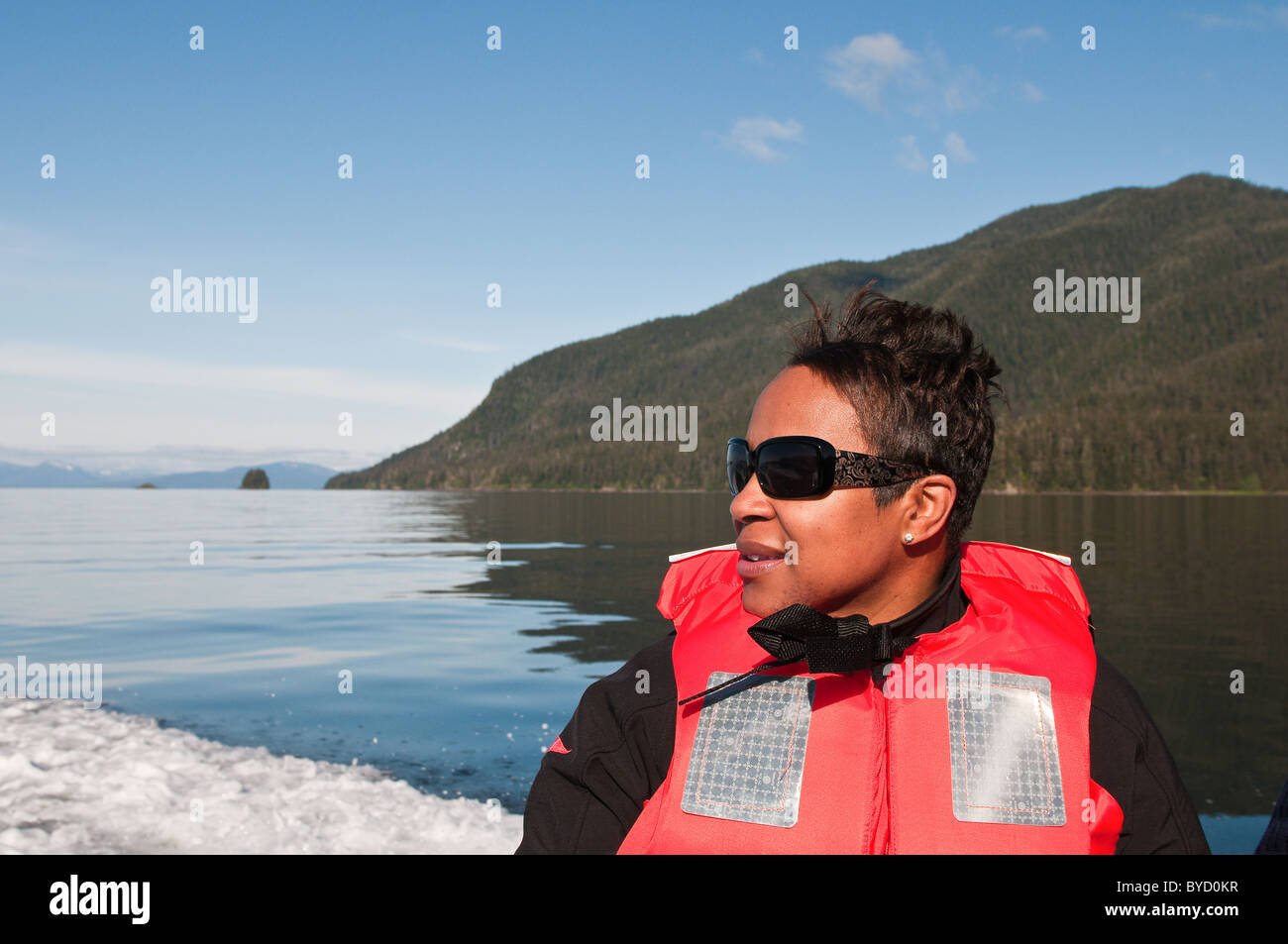 Young black woman in Windham Bay, Chuck River Wilderness Area, Tongass ...