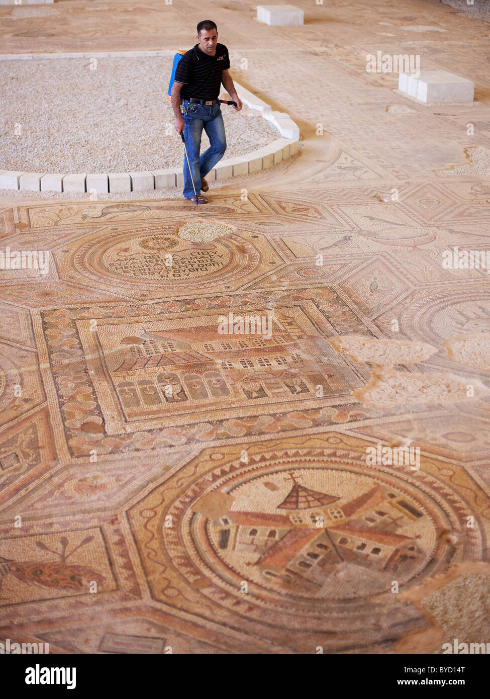 Tayyibat Al-Imam Mosaic Floor, Syria. A Syrian sprays water on the ...
