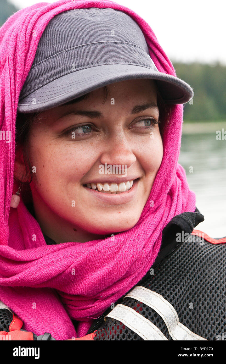 Alaska. Young woman in Thomas Bay, Chuck River Wilderness Area, Tongass ...