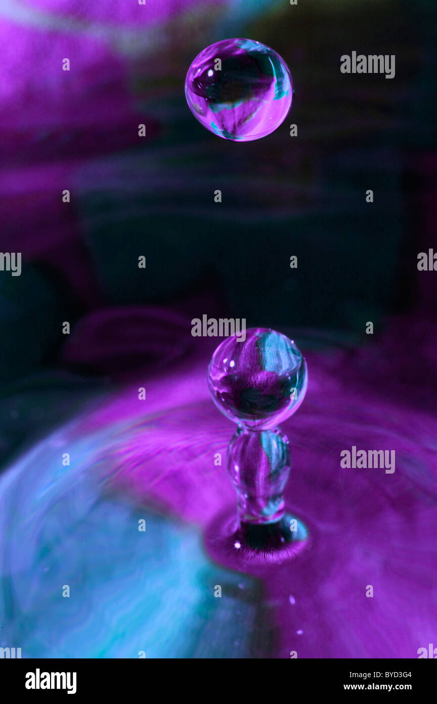 Water droplets colliding with water Stock Photo - Alamy