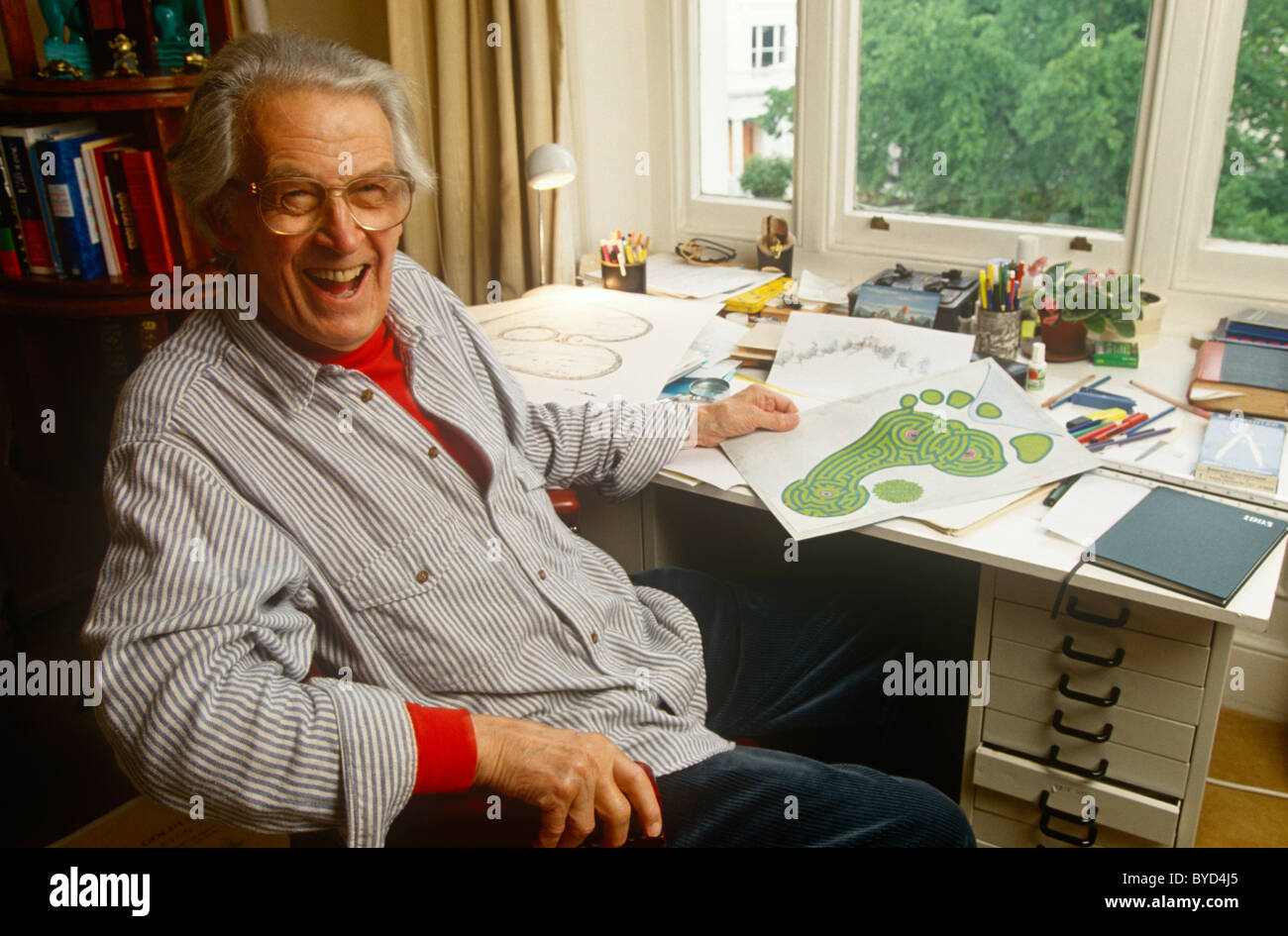 The renowned maze designer Randoll Coate working in his studio an more ...