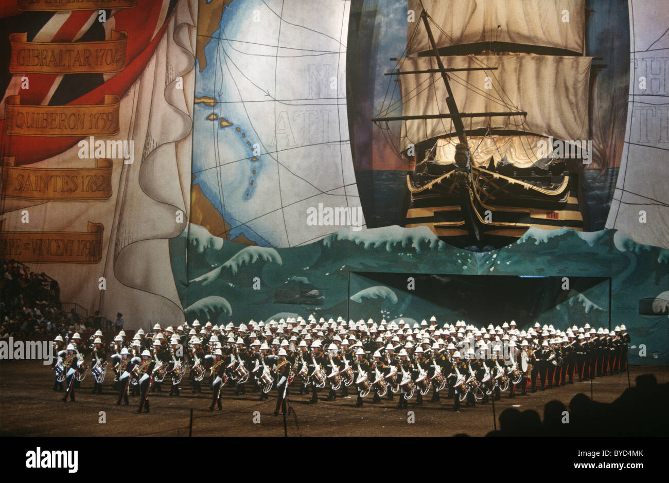 Members of the Royal Marines band march under a giant backdrop of ...
