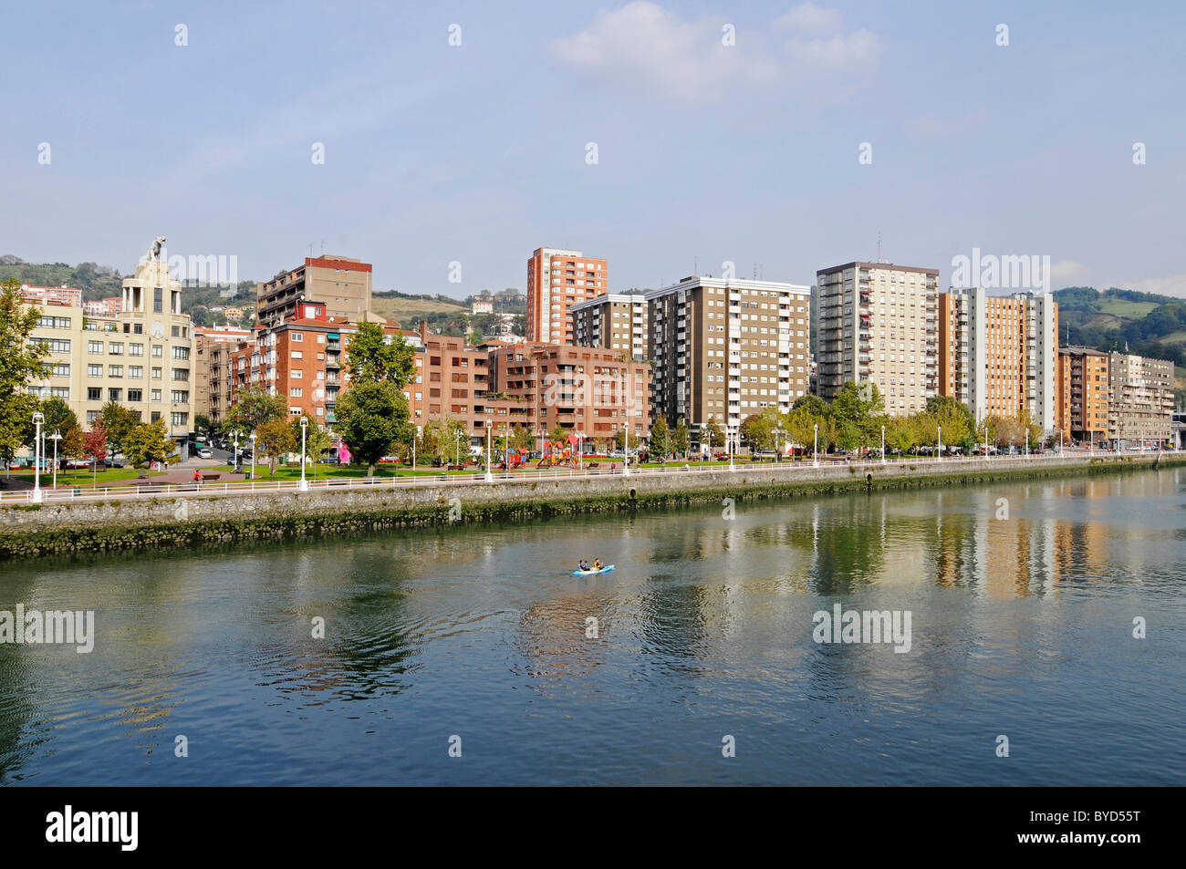 Nervion River, shore with high-rise buildings, Bilbao, Bizkaia province ...