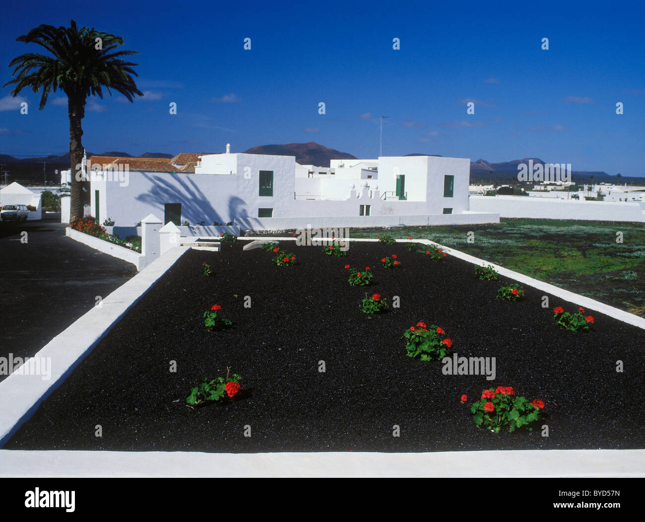 White town in a volcanic landscape, Yaiza, Lanzarote, Canary Islands ...