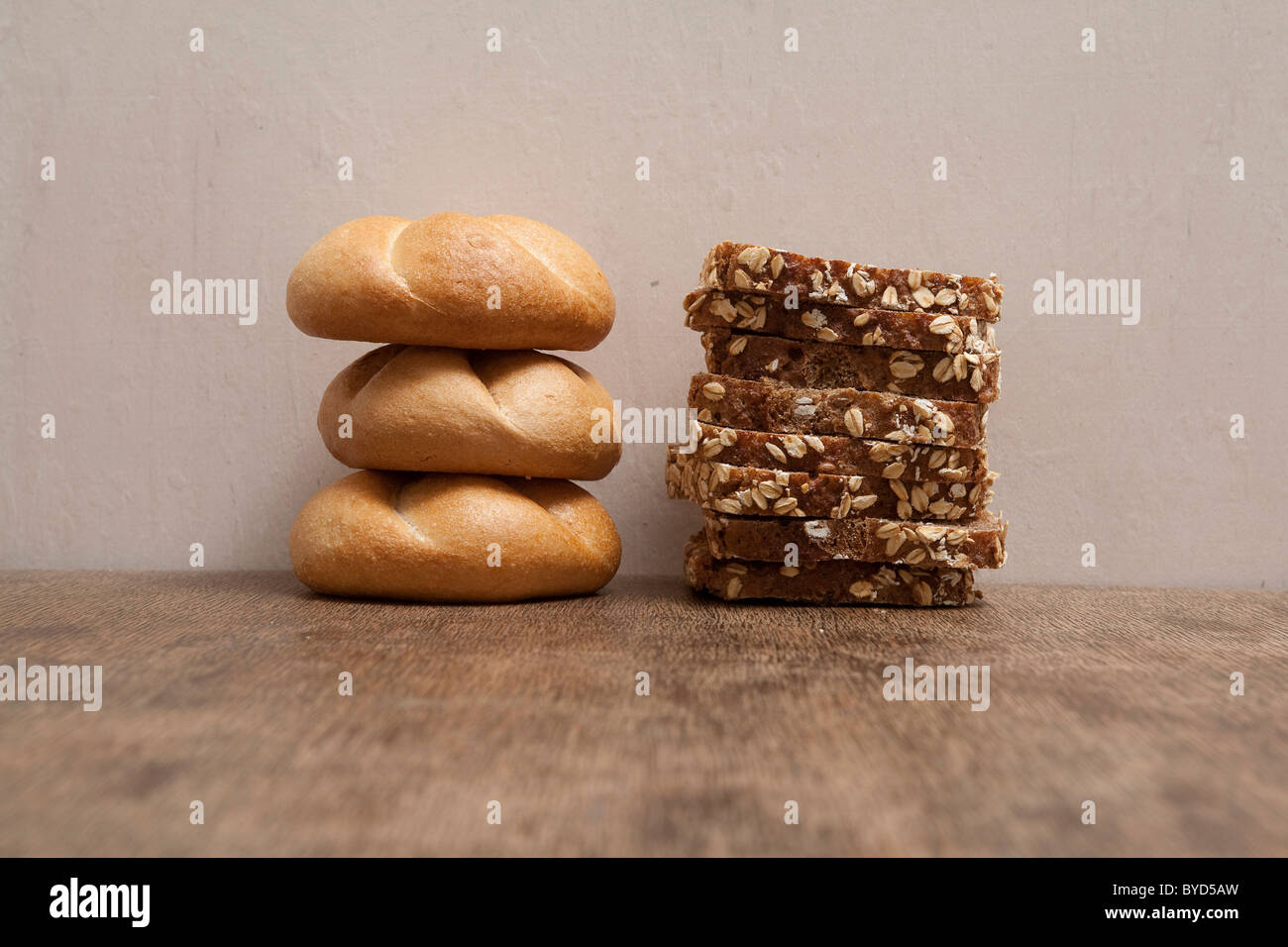 Stacks of bread rolls and sliced bread Stock Photo - Alamy