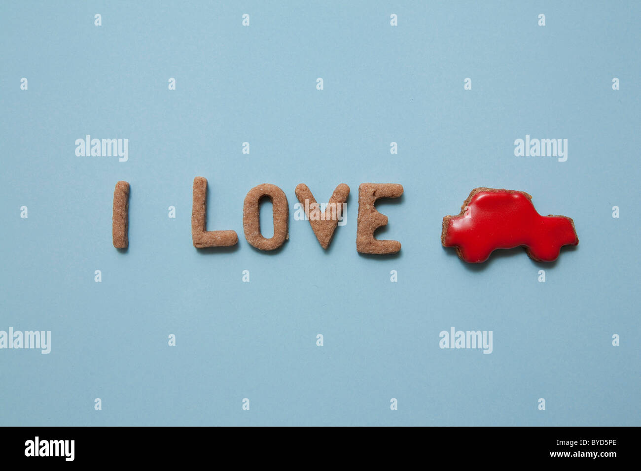 I Love, written with biscuits and a car biscuit symbolising I love cars ...