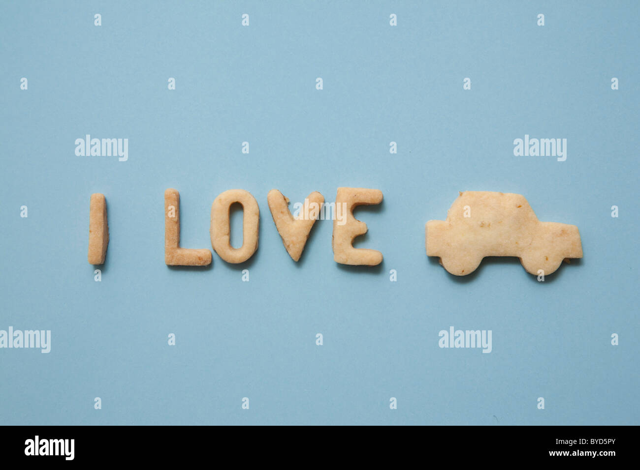 I Love, written with biscuits and a car biscuit symbolising I love cars ...