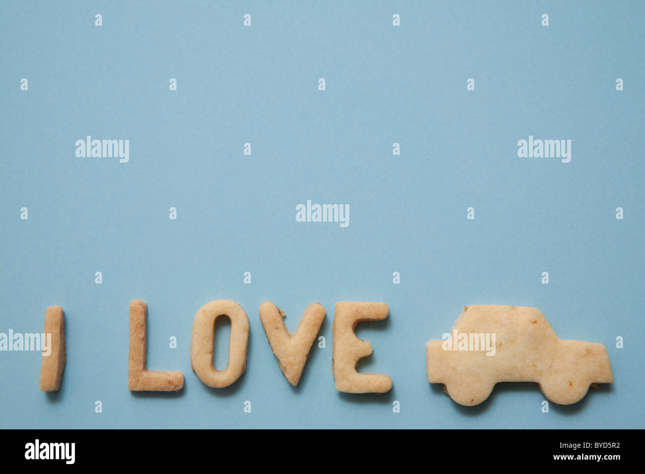 I Love, written with biscuits and a car biscuit symbolising I love cars ...