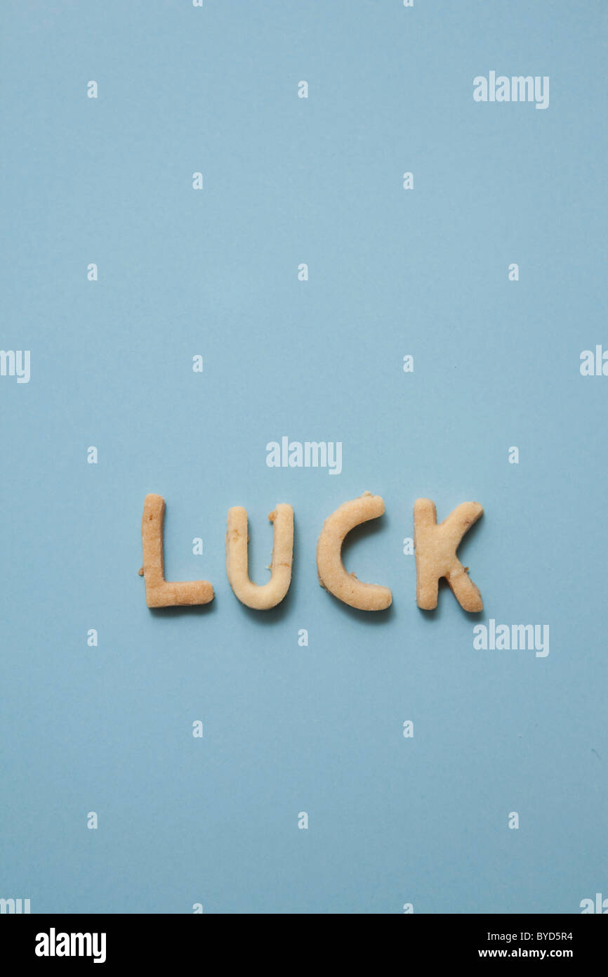 Luck, word written with biscuits Stock Photo - Alamy