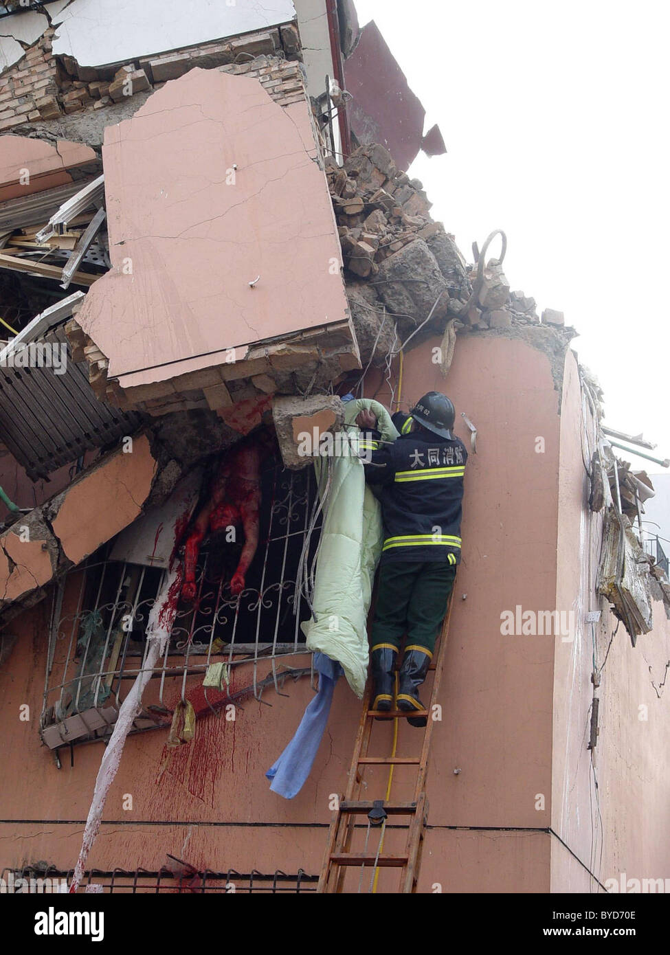* MAN SURVIVES HOUSE EXPLOSION A horribly injured man hangs from the ...