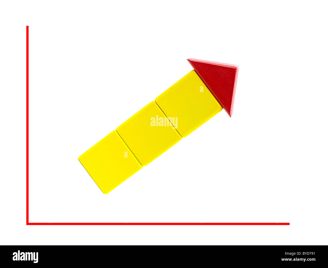 Toy blocks in the shape of an arrow on a line graph Stock Photo - Alamy