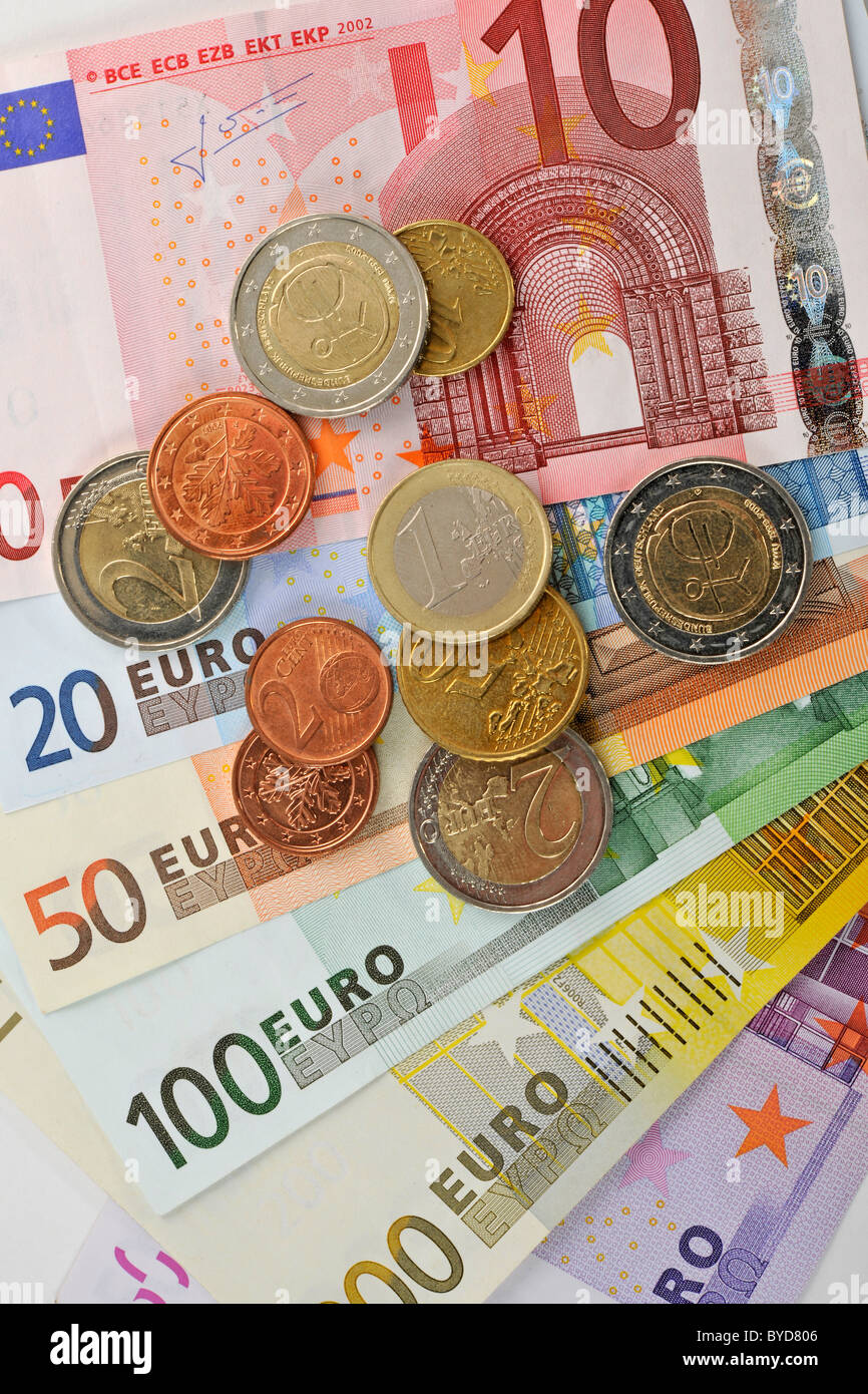 Banknotes in fan and coins hi-res stock photography and images - Alamy