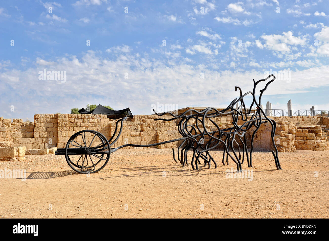 Modern sculpture of an antique car racing team, Herodian Amphitheatre ...
