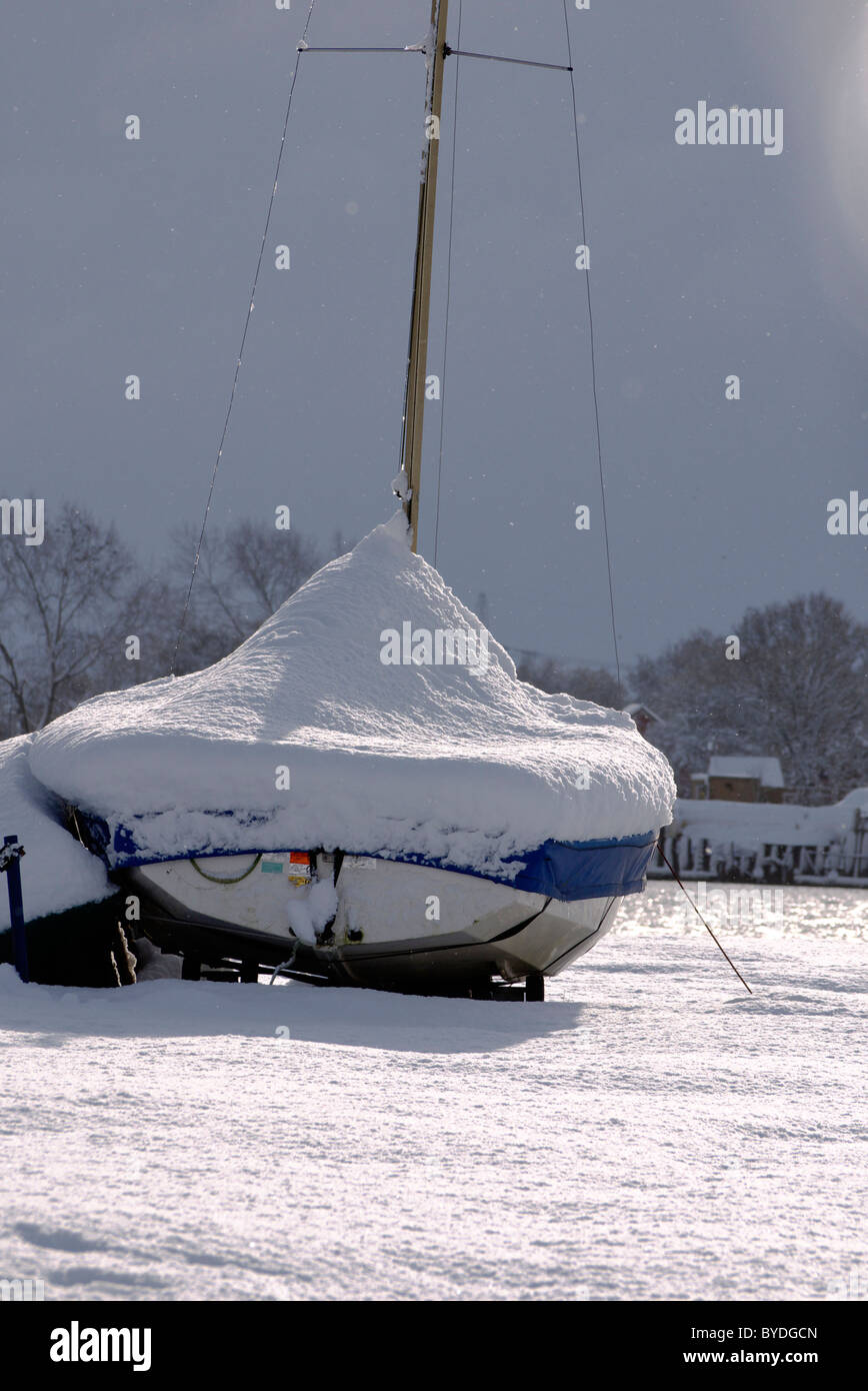 Sailing boat capped in snow Stock Photo - Alamy