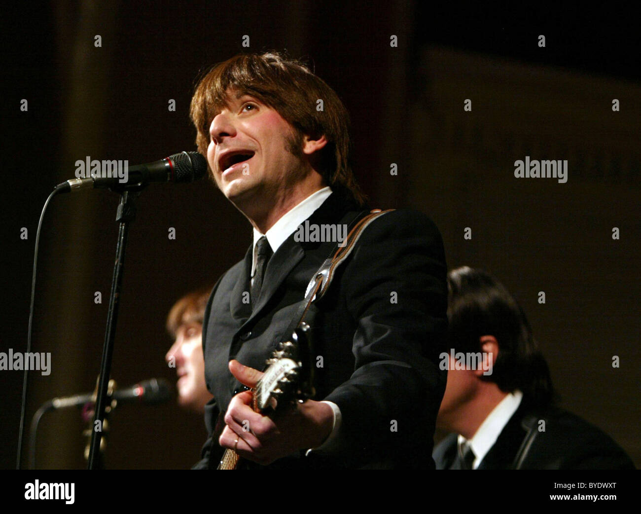 The Beatles tribute band Beatlemania, again. Beatle re-enactors ...