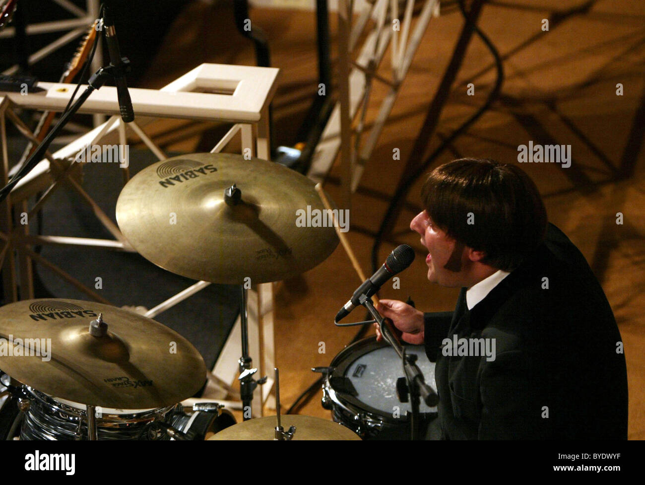 The Beatles tribute band Beatlemania, again. Beatle re-enactors ...