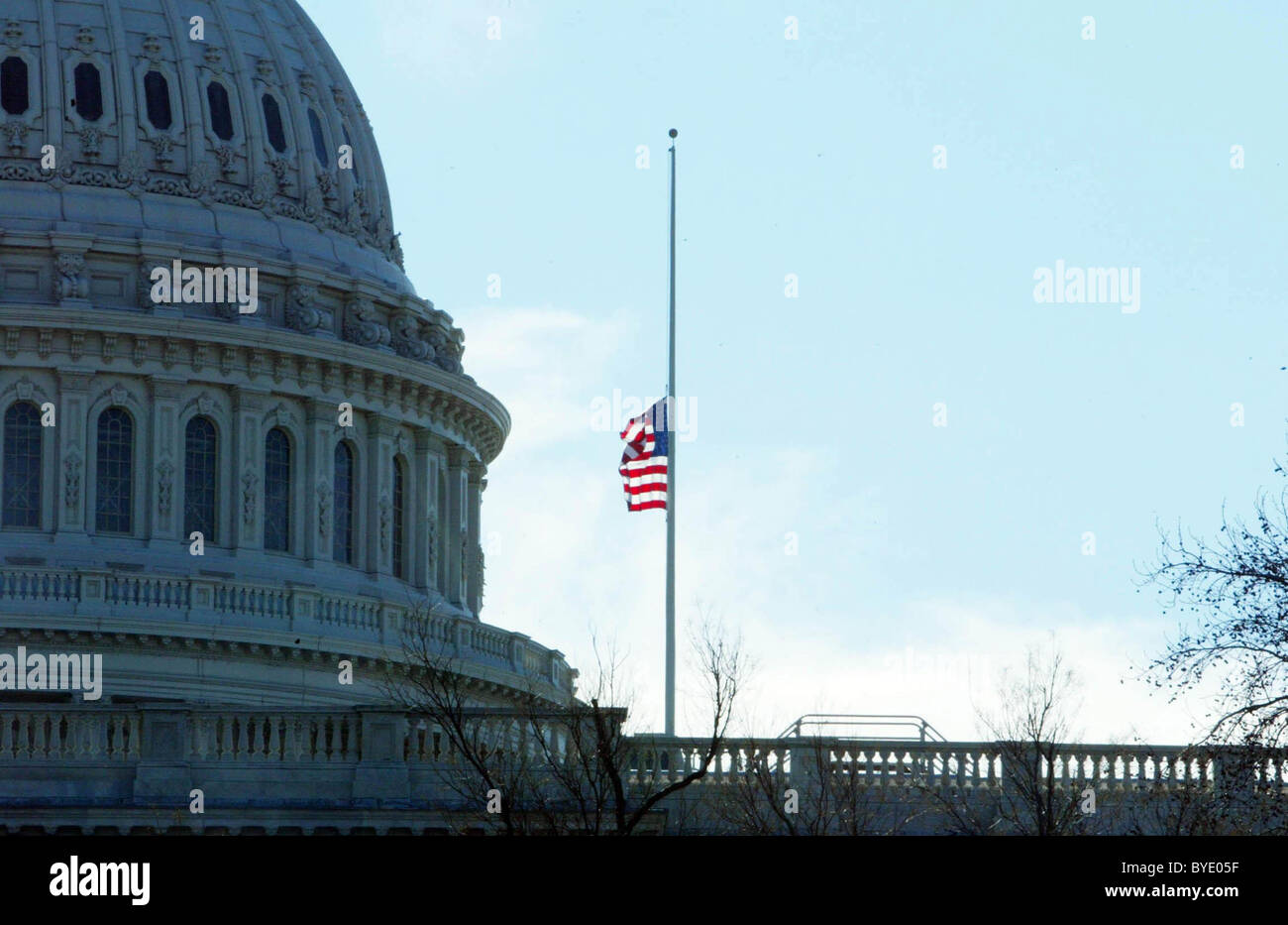 United States flag at half mast over the capitol in memory of President ...