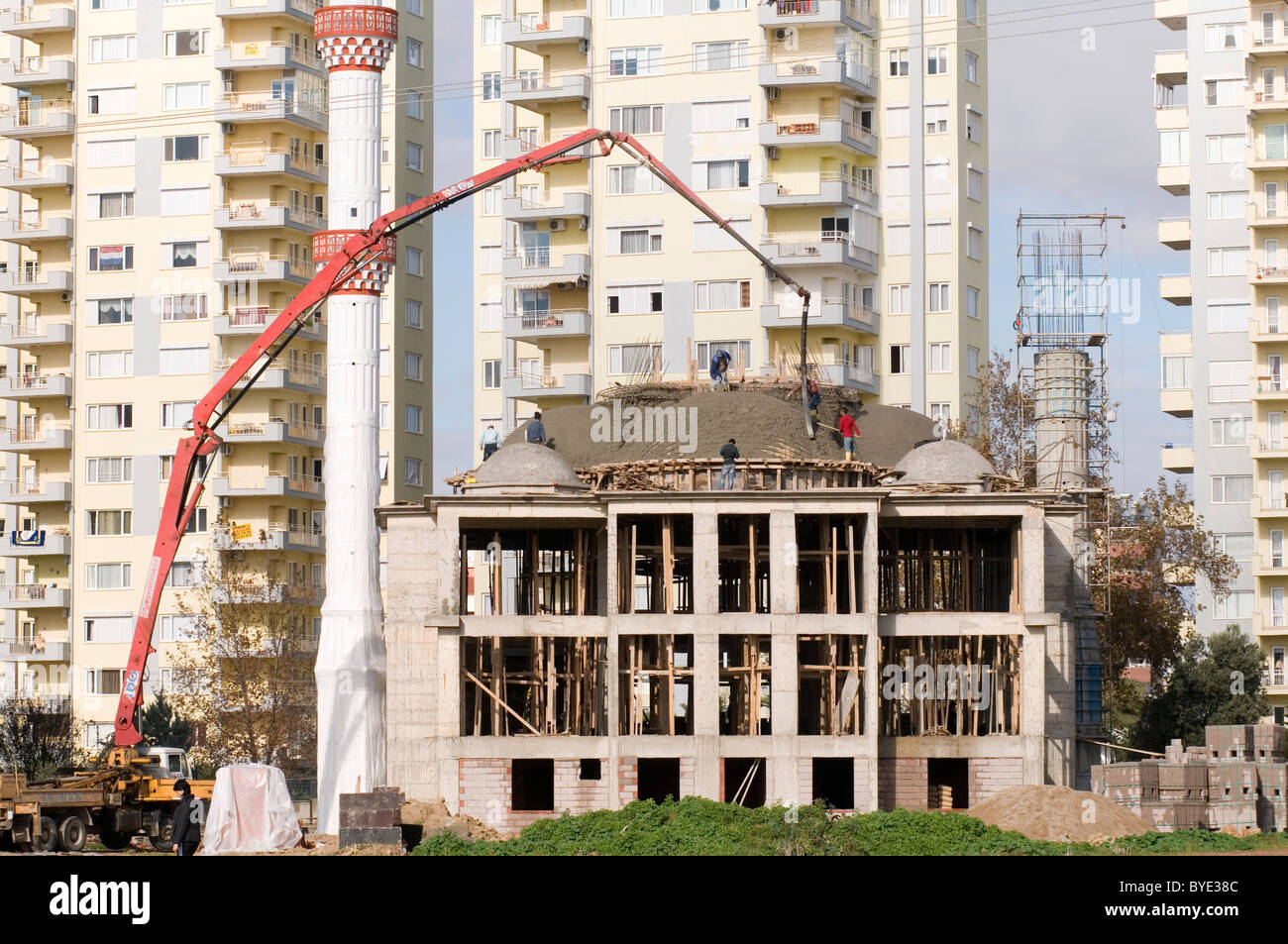 concrete roof being poured cement building builders construction mosque ...