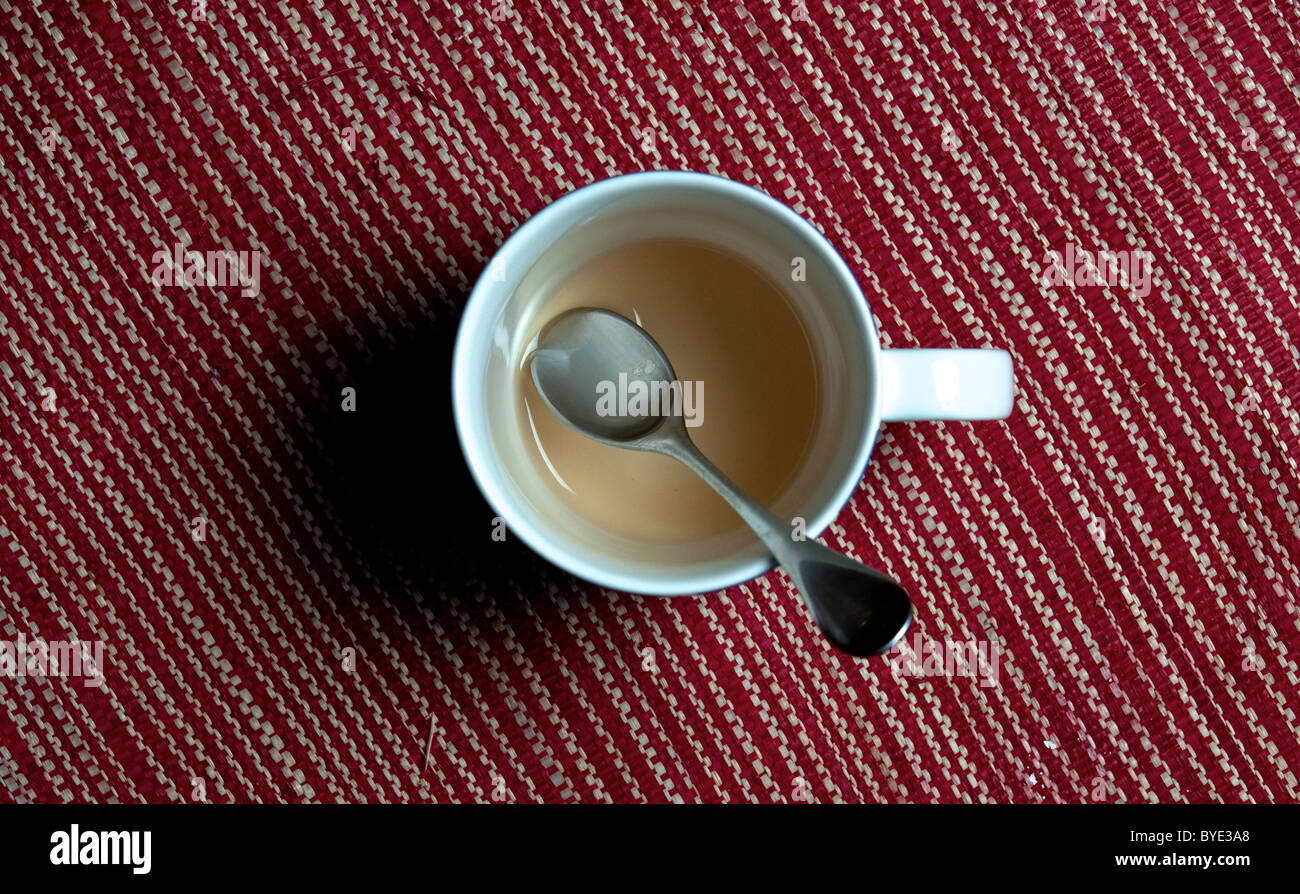 Empty tea cup on red&white stripes Stock Photo - Alamy