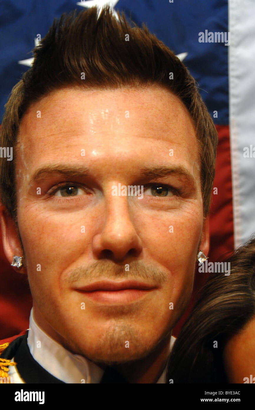 David Beckham and Victoria Beckham wax figures Madame Tussauds New York ...