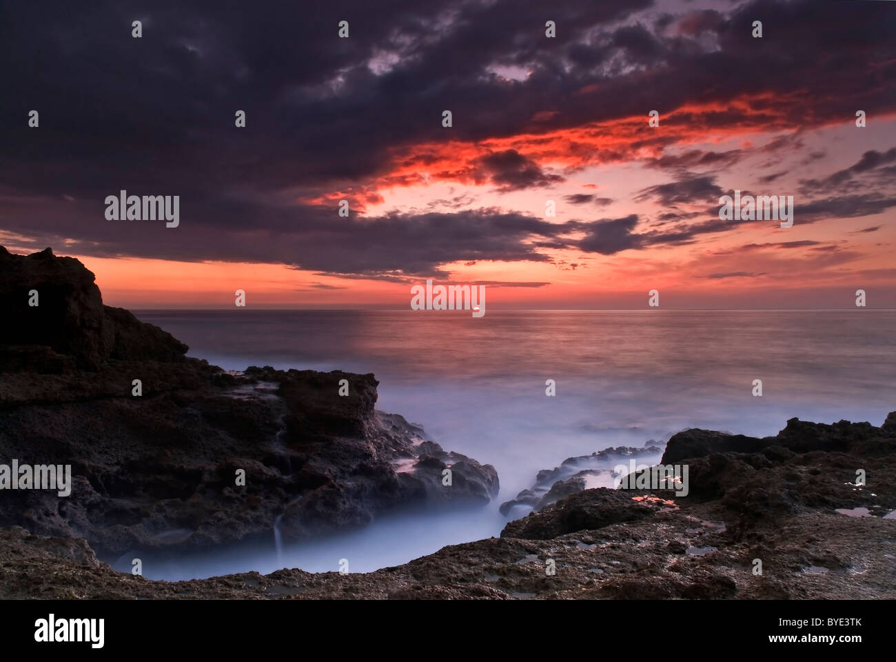 Sunset in Meco beach, Portugal Stock Photo - Alamy