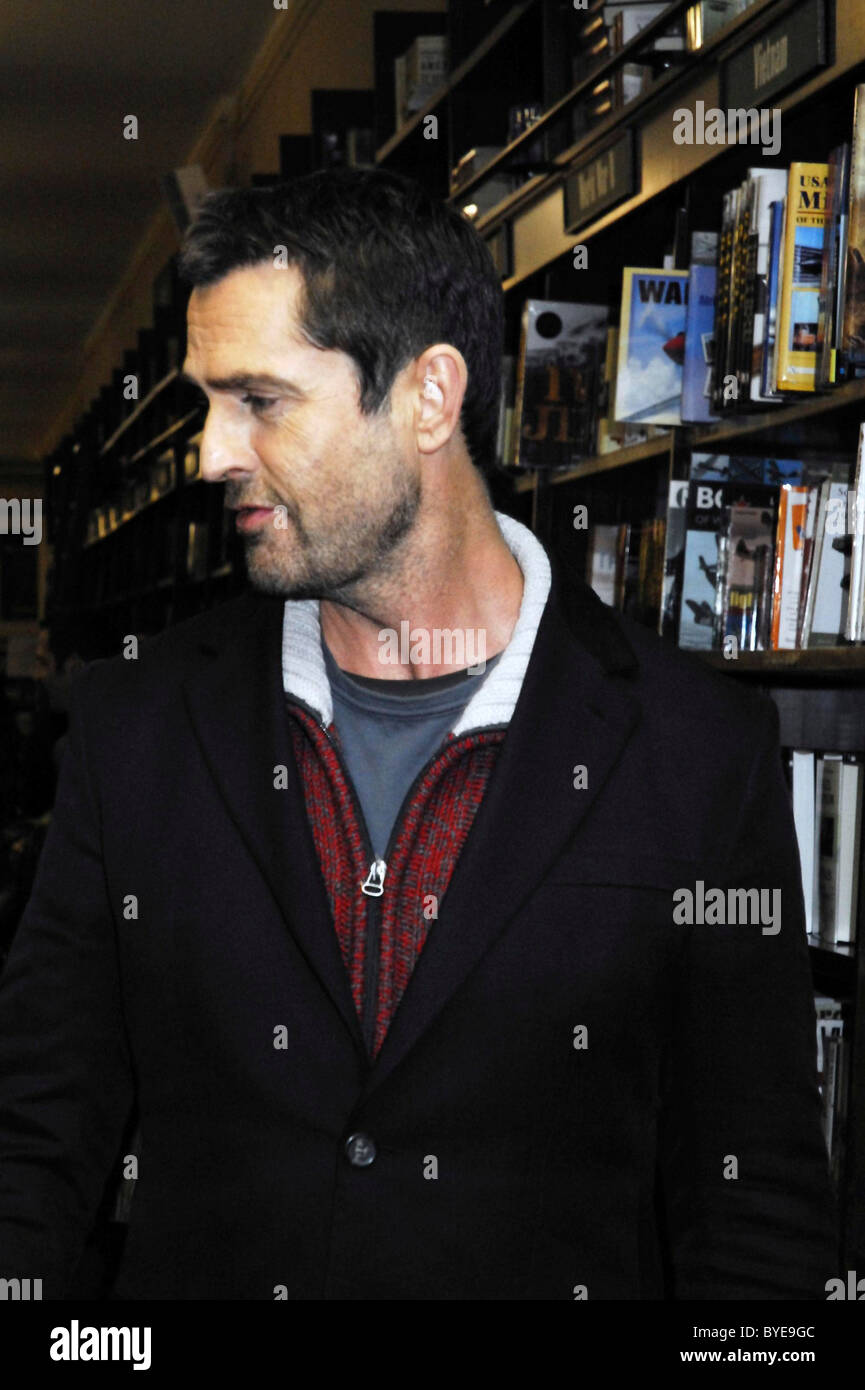Rupert Everett signs copies of his new autobiography 'Red Carpet and ...