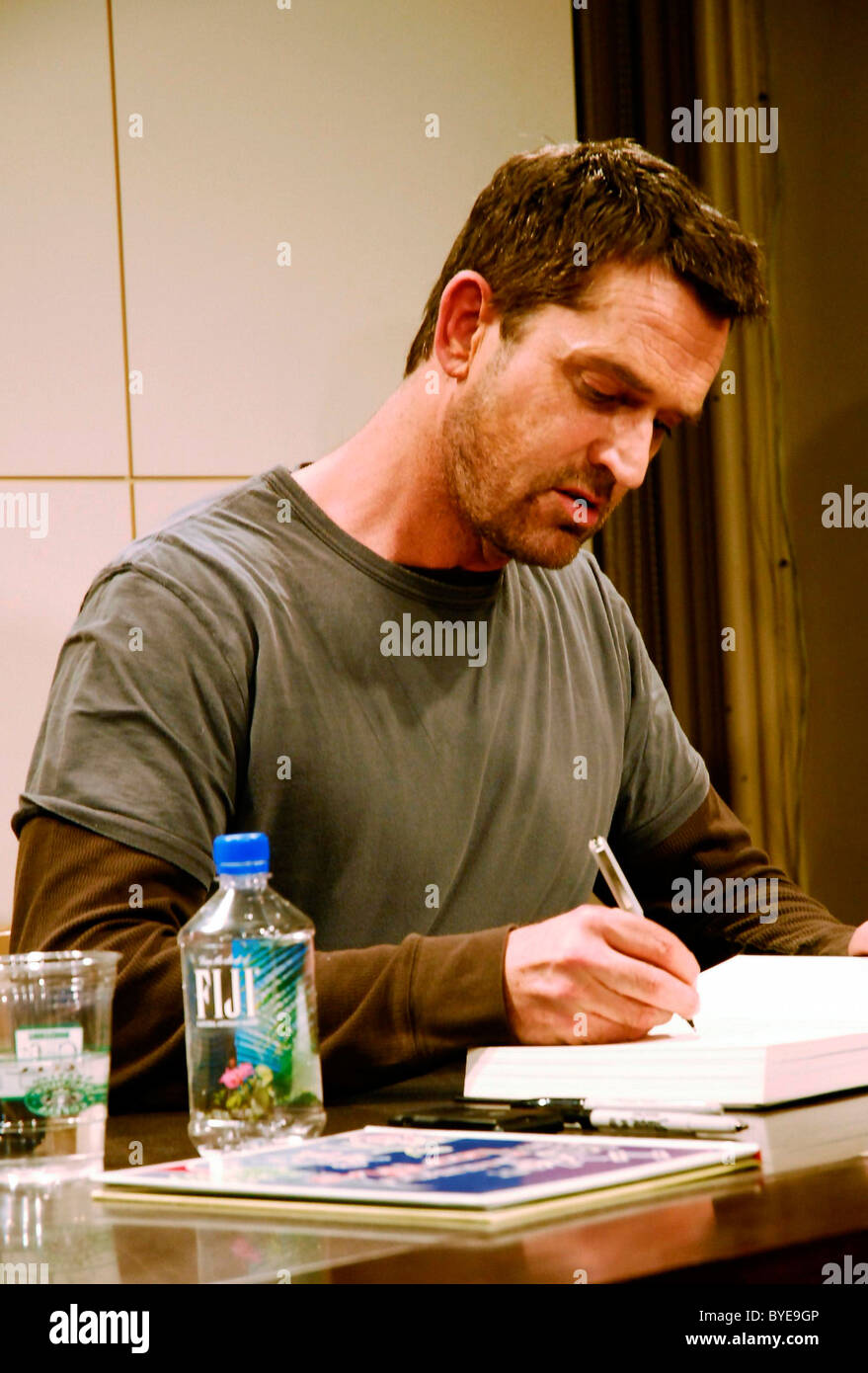 Rupert Everett signs copies of his new autobiography 'Red Carpet and ...