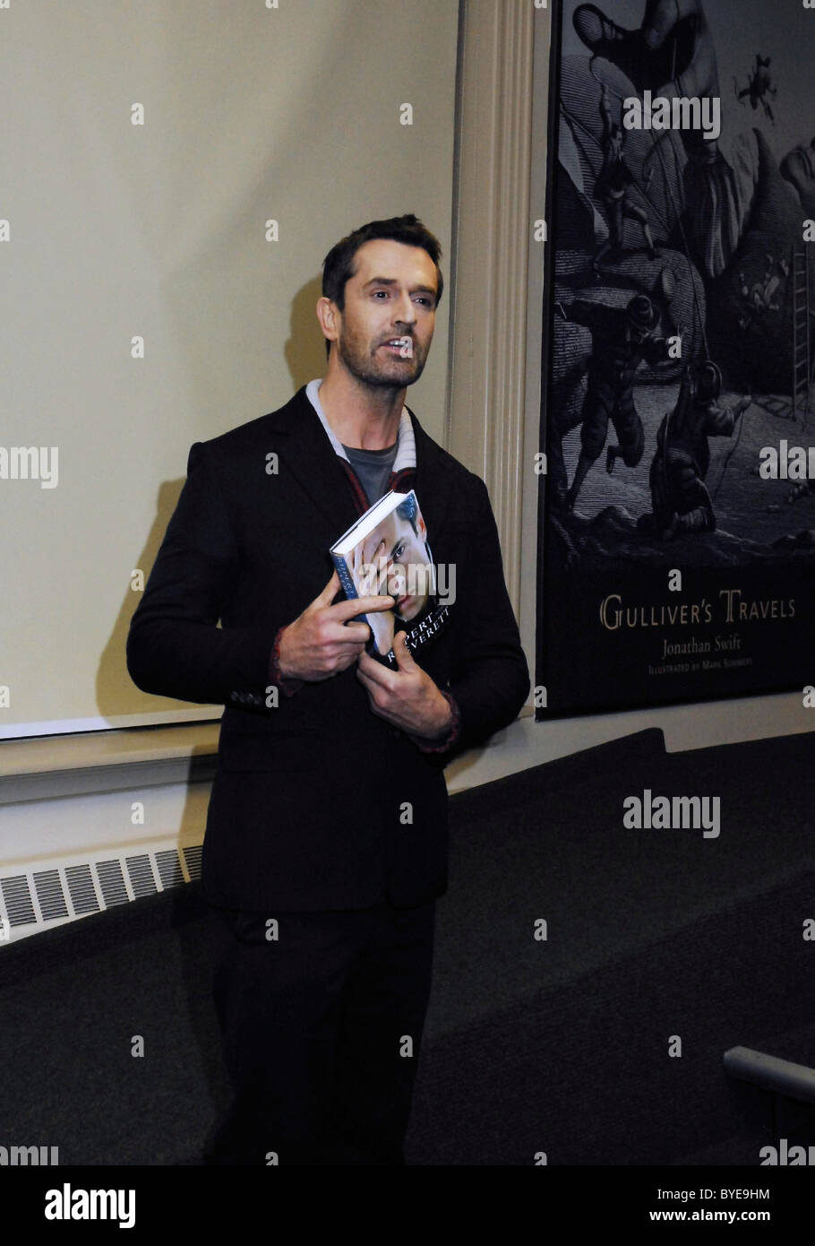 Rupert Everett signs copies of his new autobiography 'Red Carpet and ...