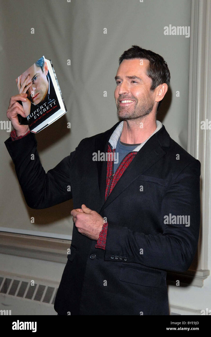 Rupert Everett signs copies of his new autobiography 'Red Carpet and ...