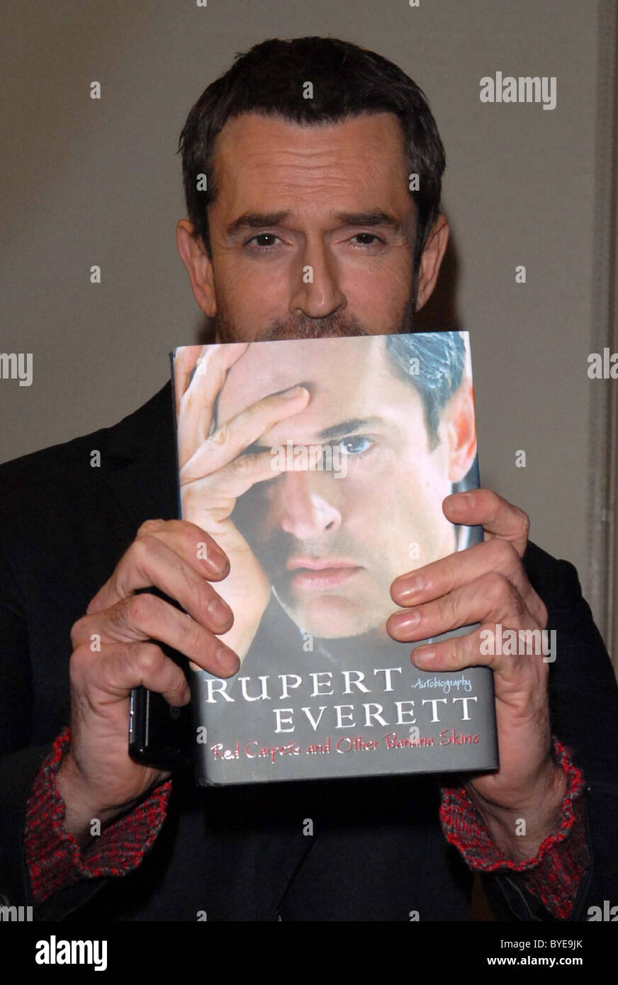 Rupert Everett signs copies of his new autobiography 'Red Carpet and ...