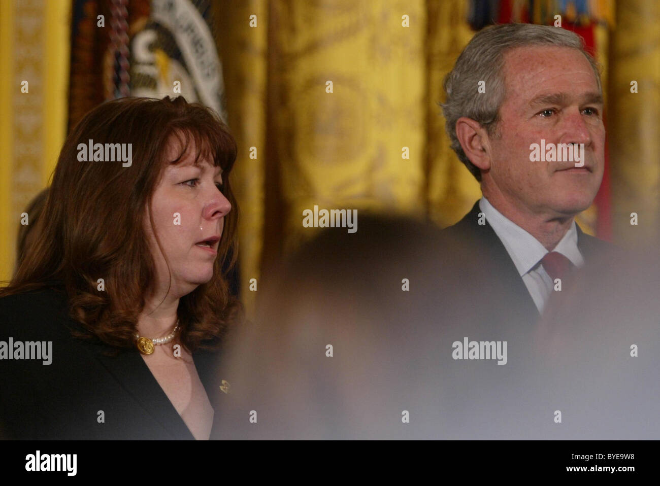 President George W. Bush with Debra Dunham (mother of Marine) President ...